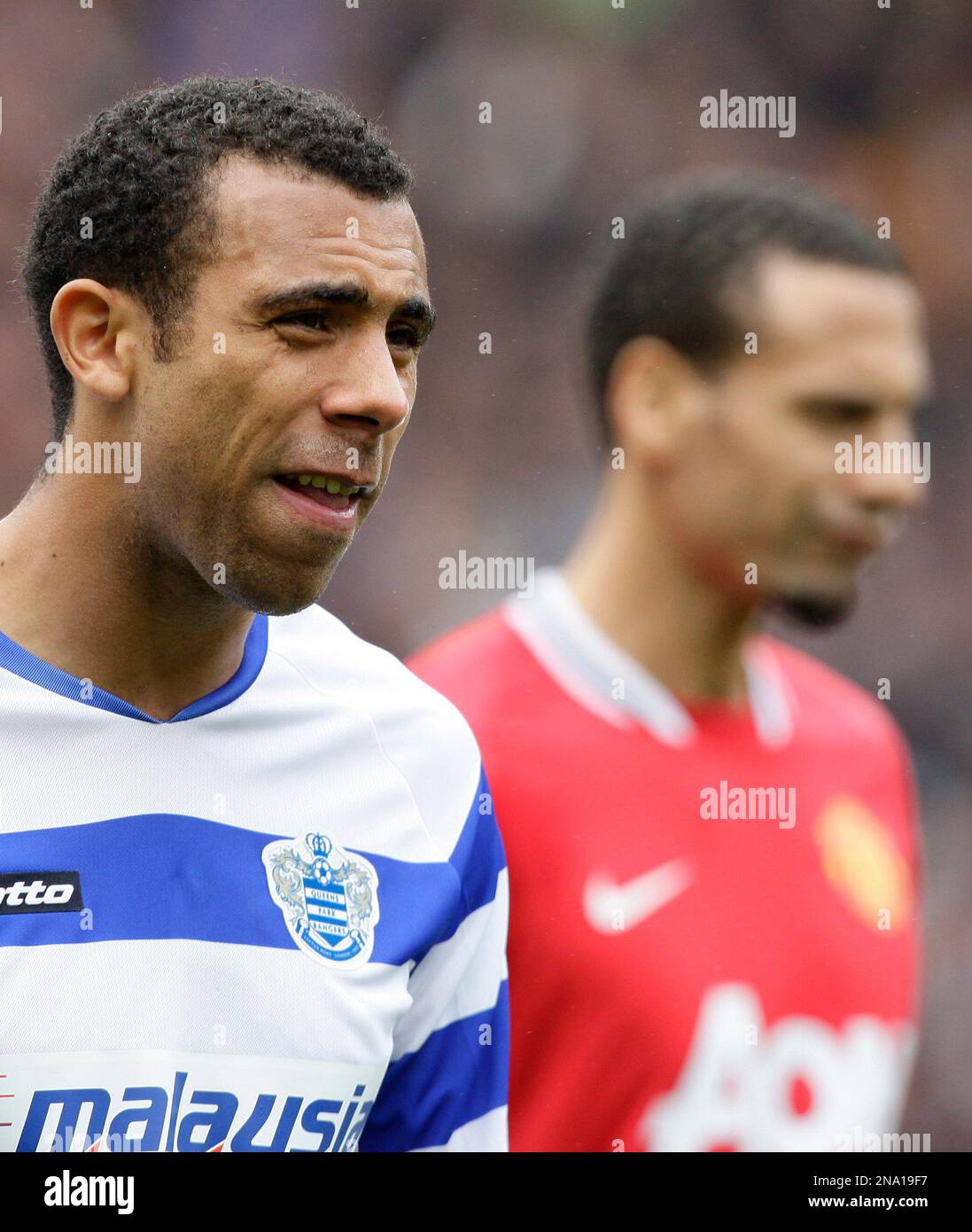 Queens Park Rangers' Anton Ferdinand, left, and his brother Manchester ...