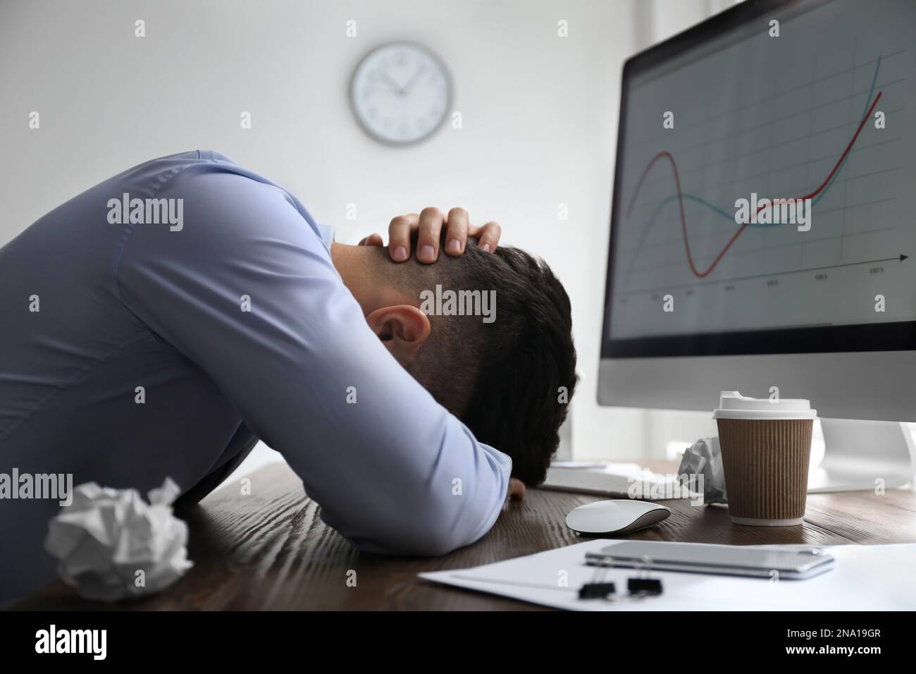 Stressed out businessman at workplace in office Stock Photo - Alamy