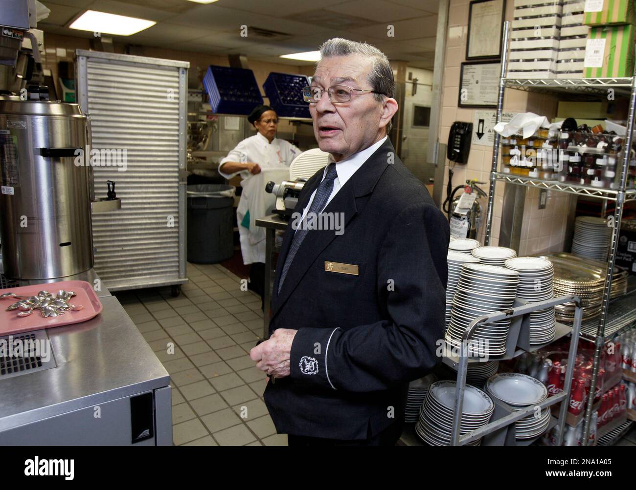Waiter Louis Rodopoulos, who has worked at New York's St. Regis Hotel ...