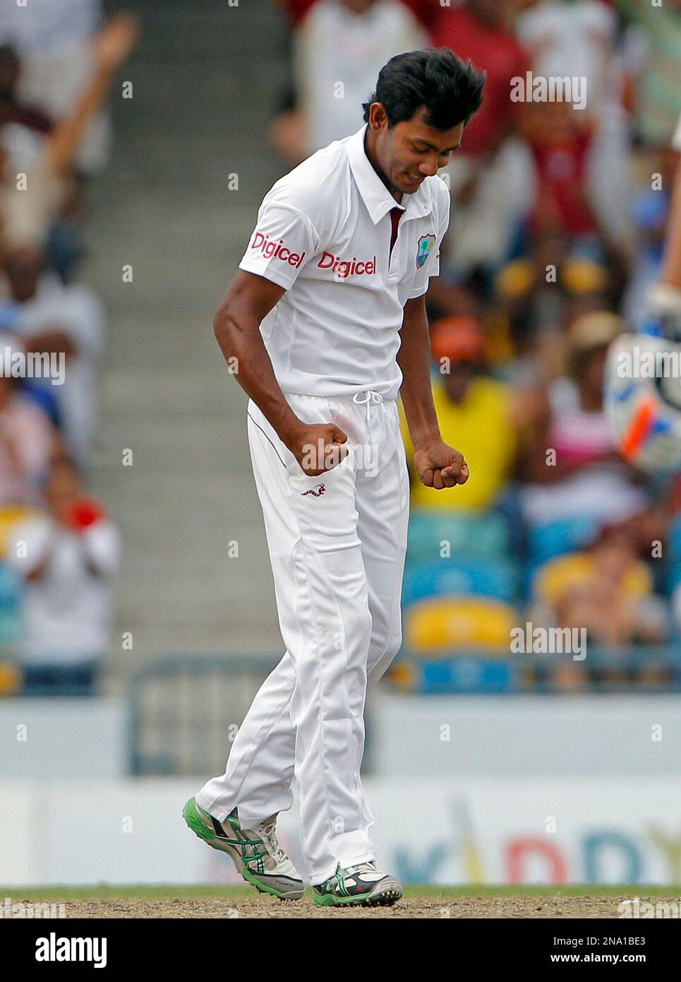 West Indies' spin bowler Devendra Bishoo celebrates after taking the ...