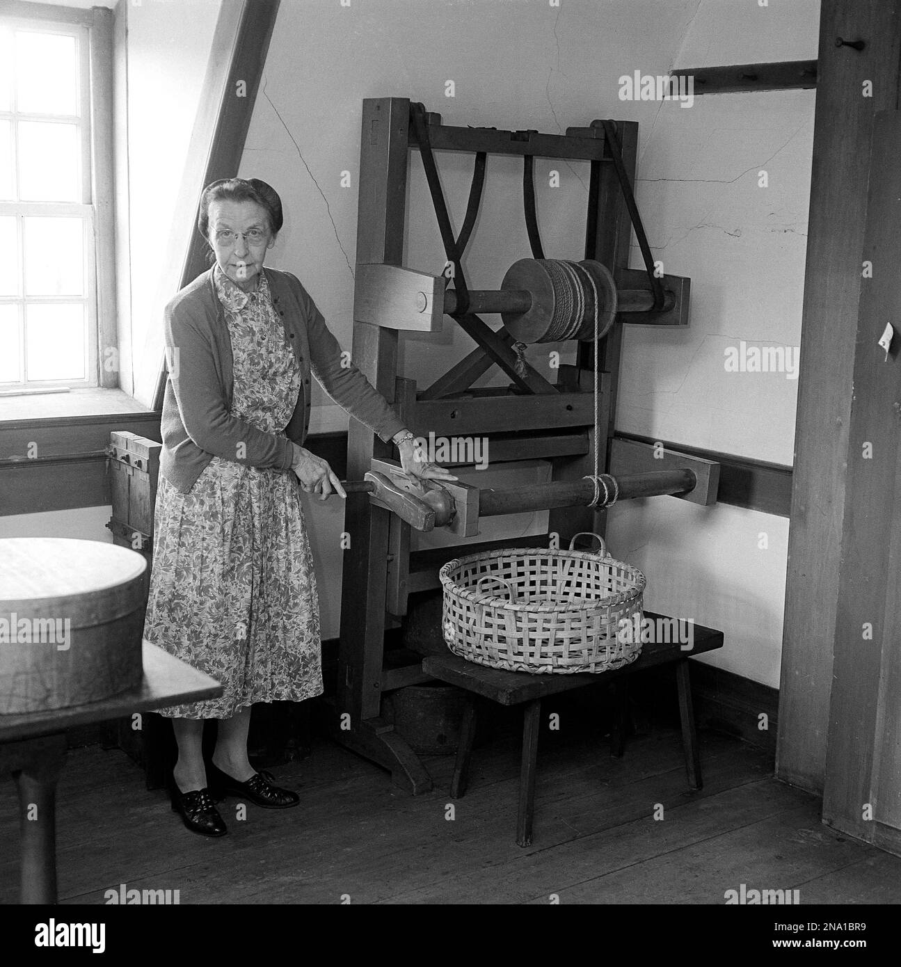 A self-acting cheese press, one of many Shaker inventions, is ...