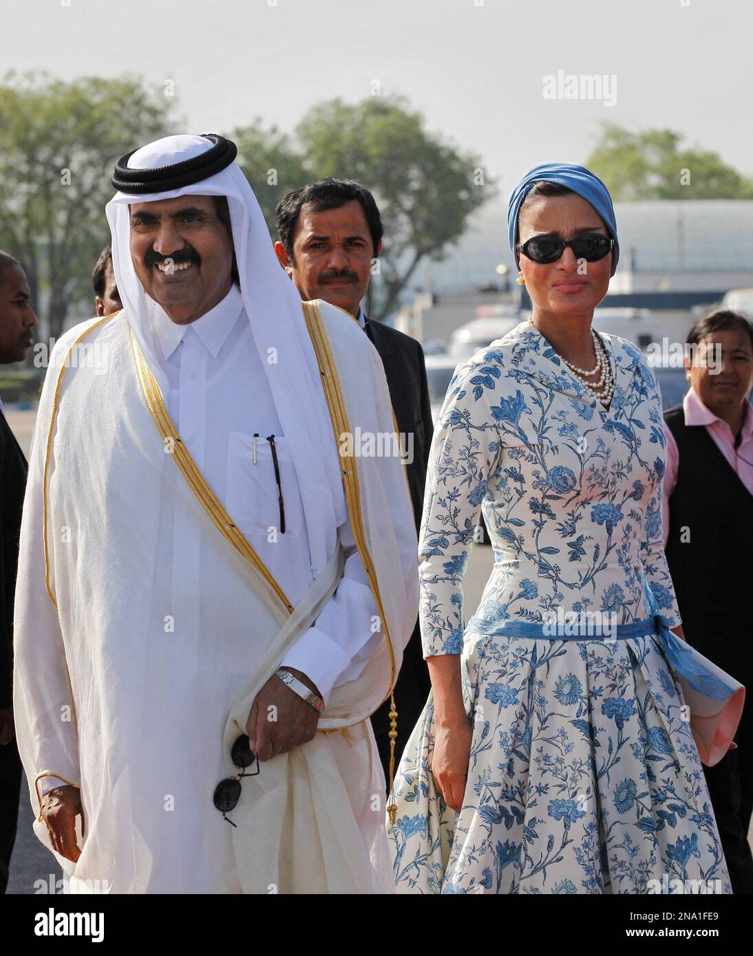 Qatar's Emir Sheikh Hamad bin Khalifa Al Thani, left, and his wife Sheikha Moza bint Nasser Al ...