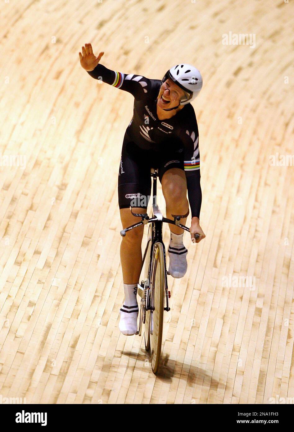 New Zealand's Alison Shanks celebrates after winning the women's ...