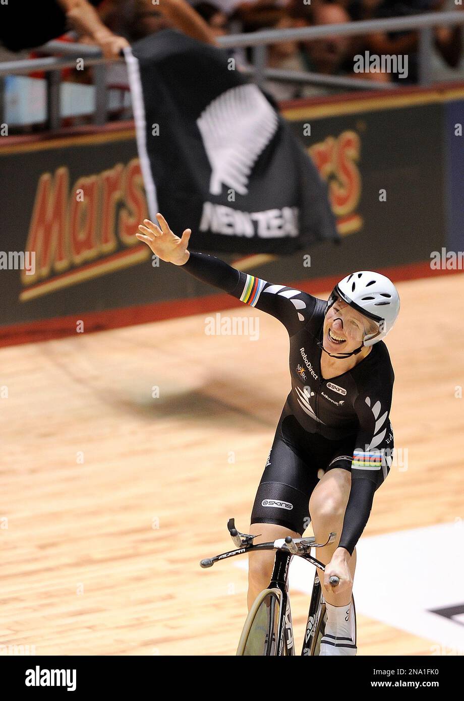 New Zealand's Alison Shanks celebrates winning the women's individual ...