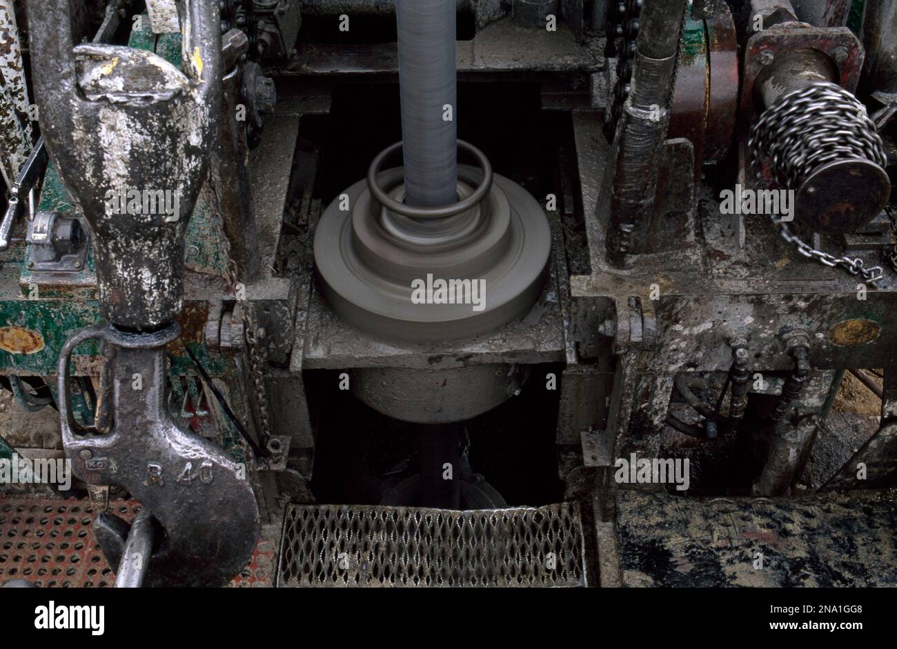 A drilling rig turns for hours on end at a coal bed methane well site ...