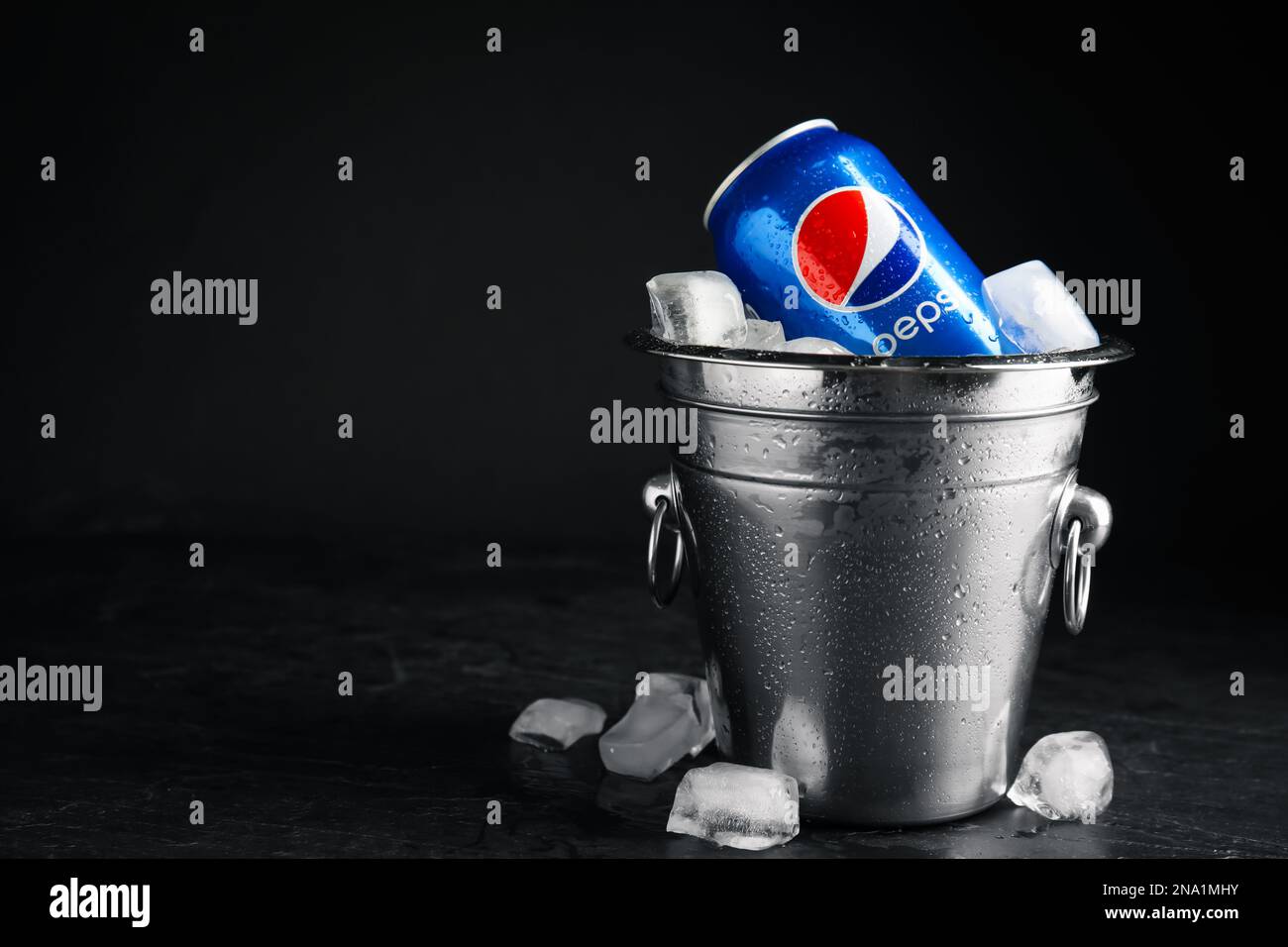 MYKOLAIV, UKRAINE - FEBRUARY 11, 2021: Can of Pepsi and ice cubes in ...