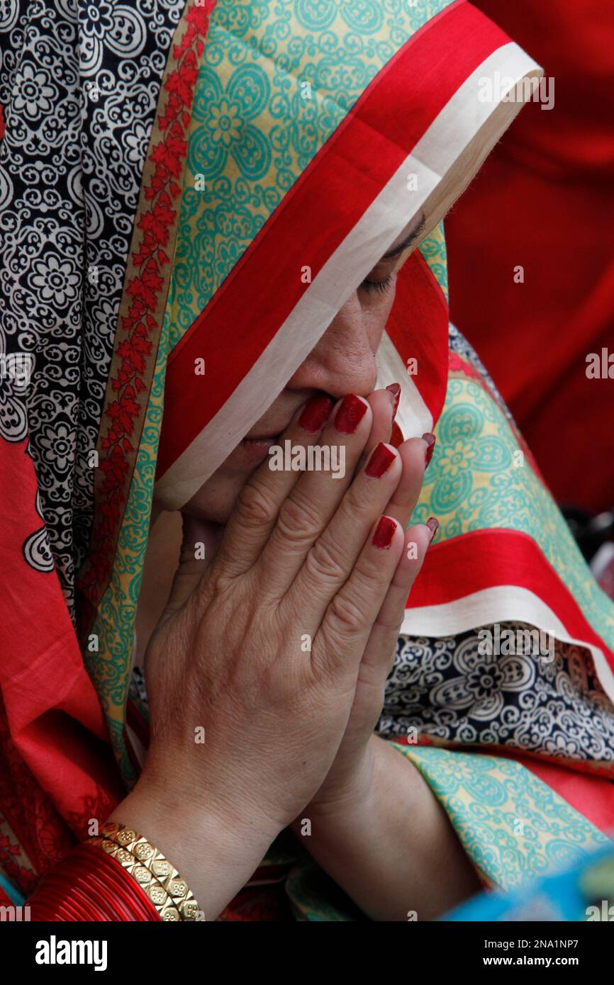 A Pakistani Christian woman attends a Mass on Good Friday at a local ...