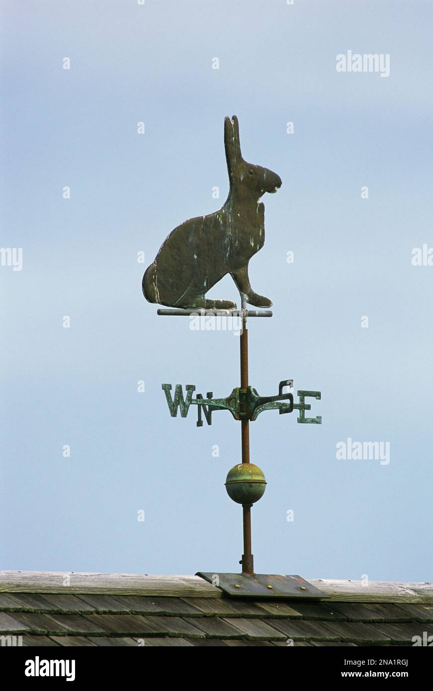 A rabbit-shaped weathervane atop a roof.; Chatham, Cape Cod ...
