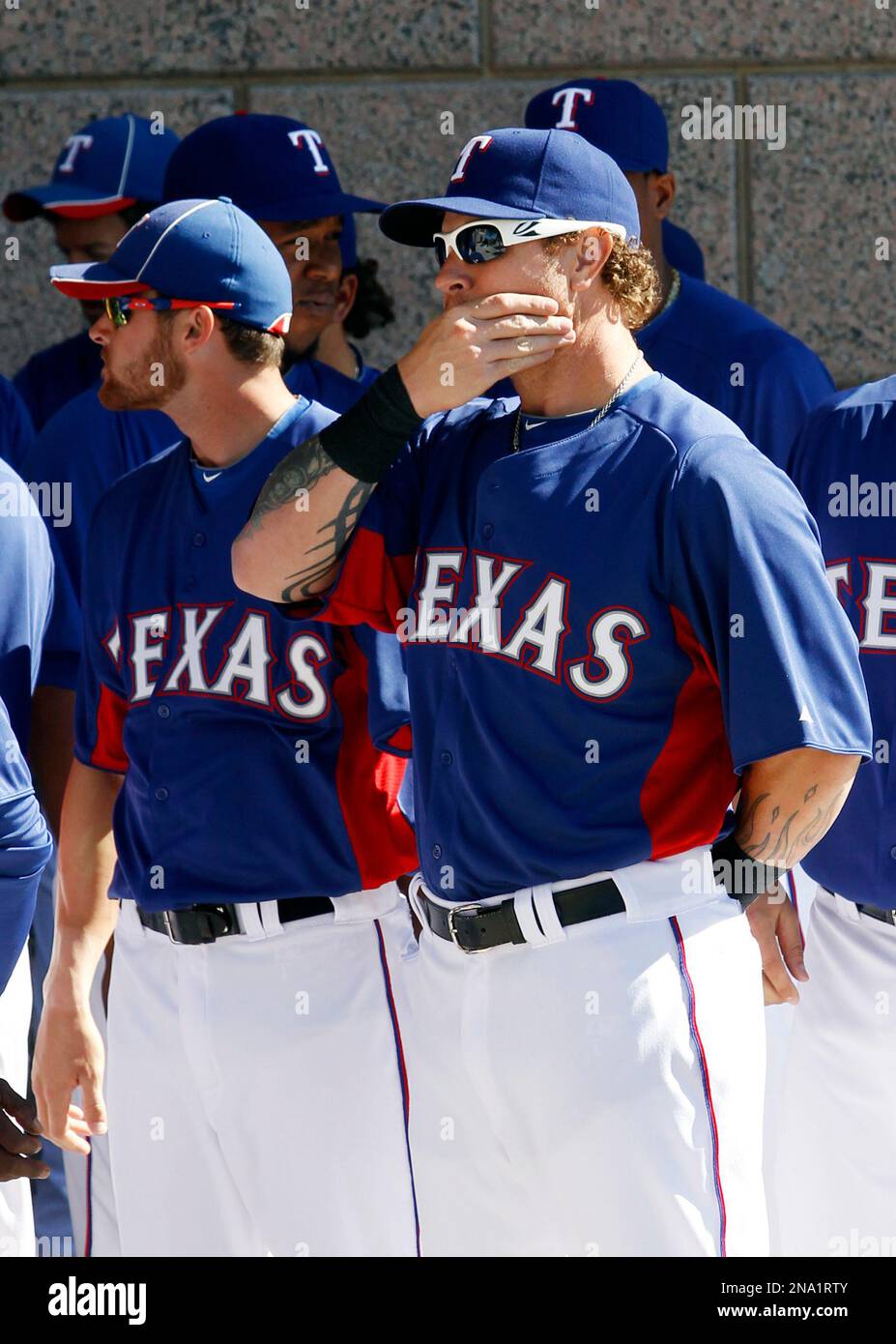 Texas Rangers' Josh Hamilton listens to a speech during the Fan Statue ...