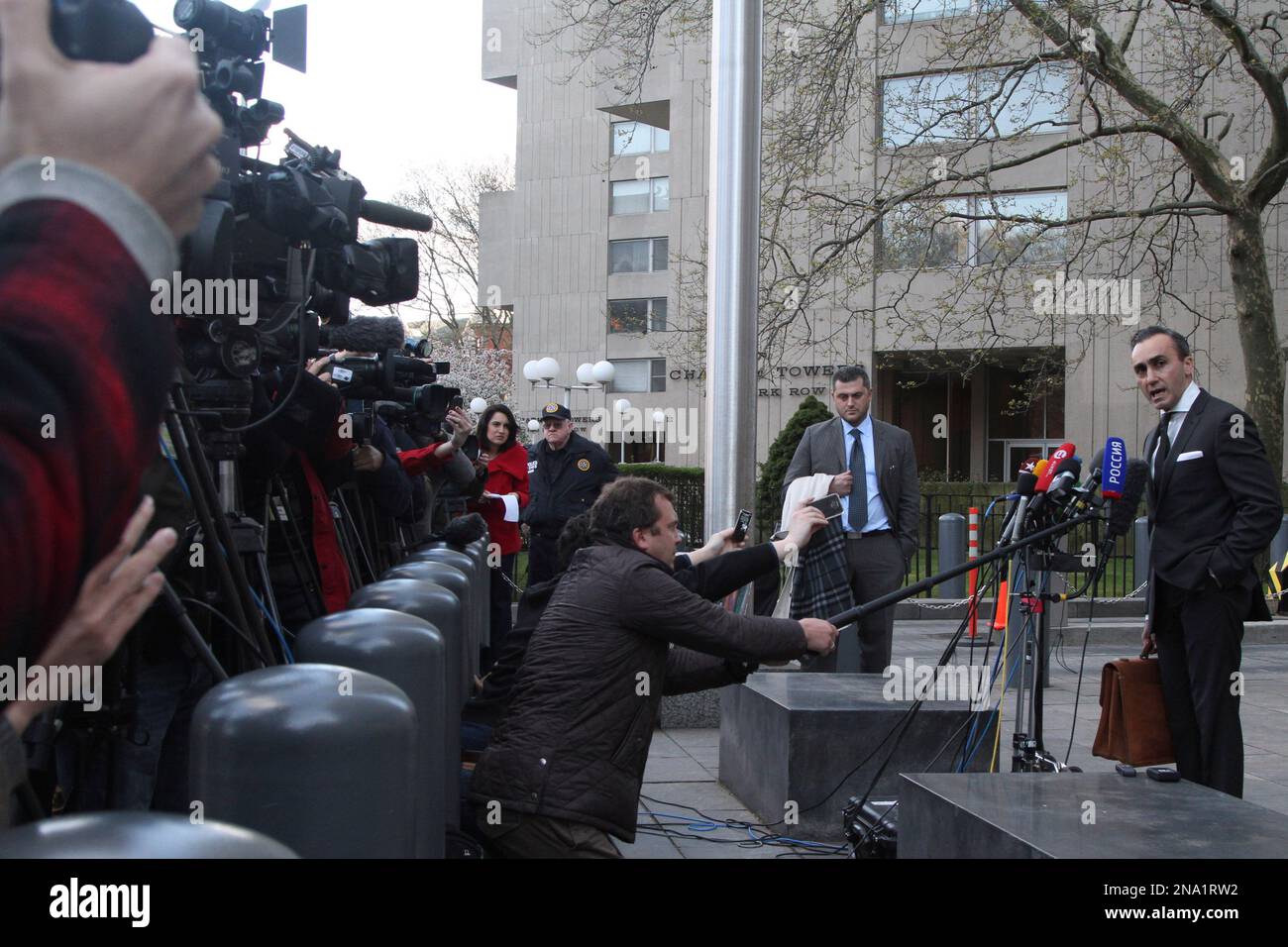 Attorney Albert Dayan speaks to reporters outside Federal court in ...