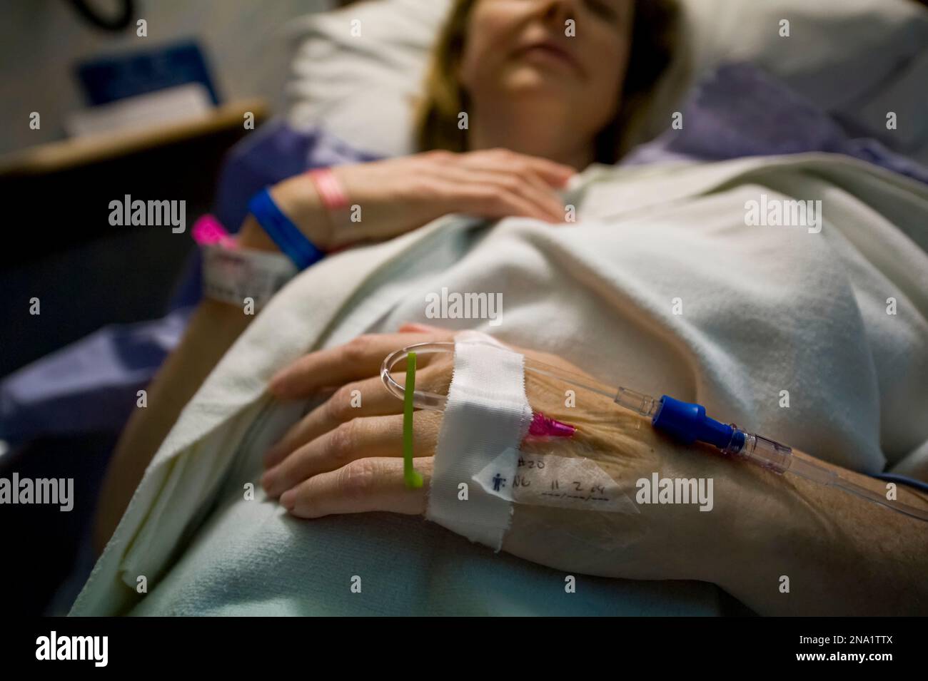 Woman recovers from surgery in a hospital; Lincoln, Nebraska, United ...