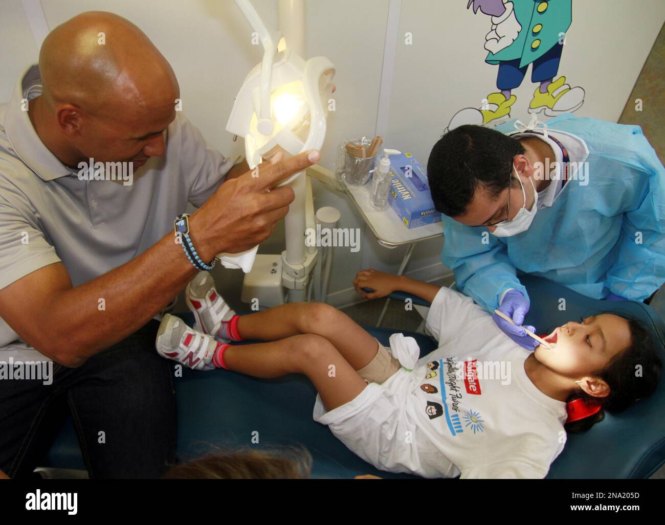 COMMERCIAL IMAGE - In this photo taken by AP Images for Colgate ...