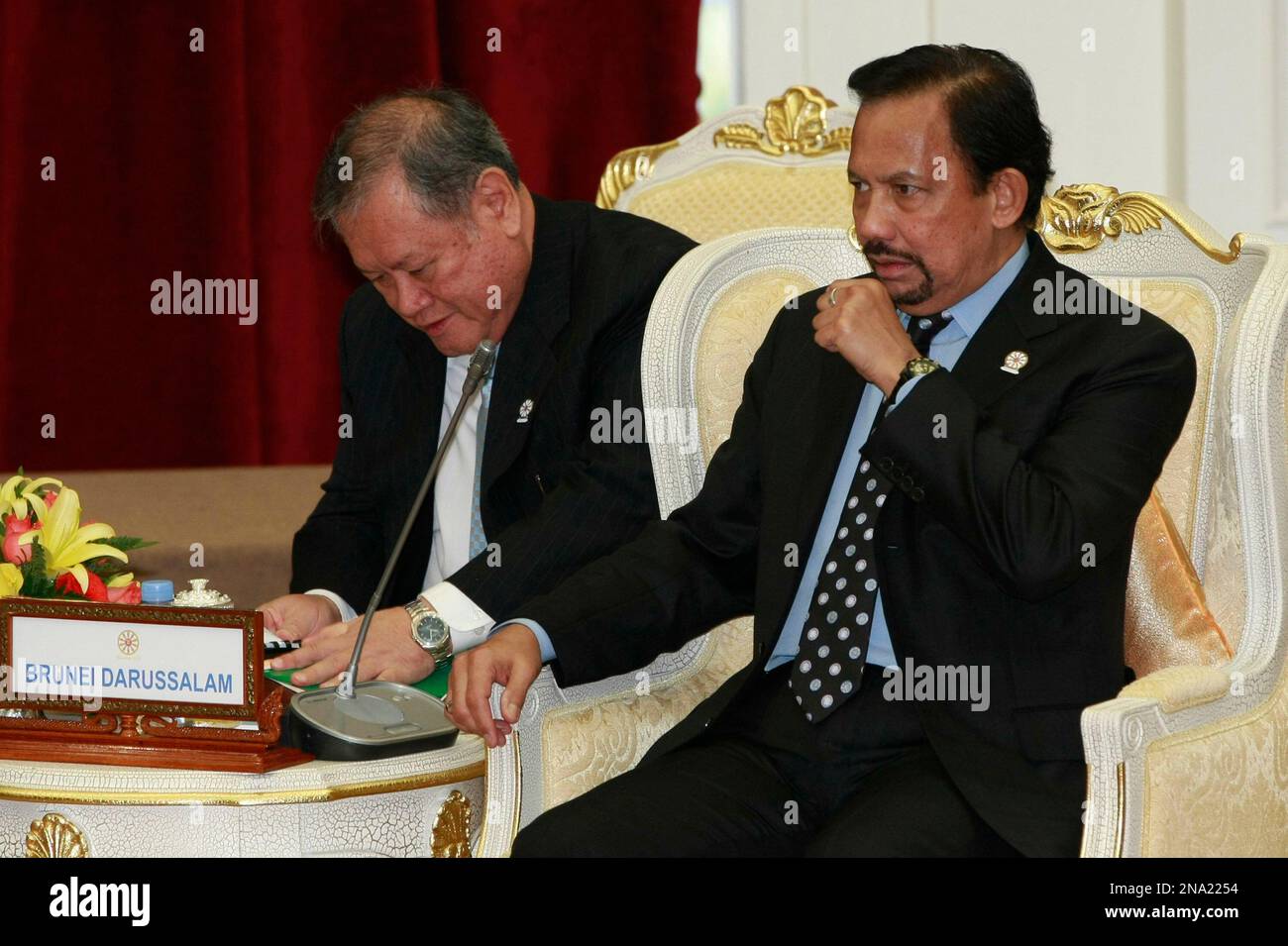 Brunei's Sultan Hassanal Bolkiah, right, and Brunei's second Foreign ...