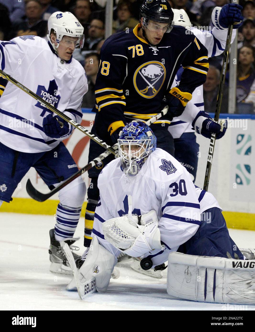 Toronto Maple Leafs goalie Ben Scrivens makes a save under pressure ...