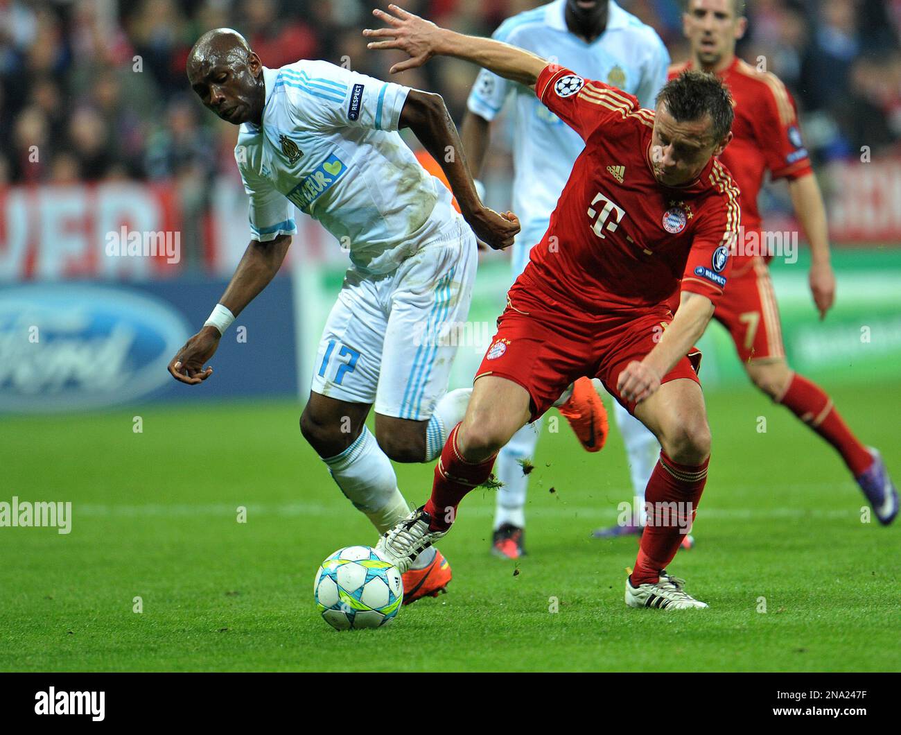 Bayern's Ivica Olic of Croatia, right, and Marseille's Stephane Mbia ...
