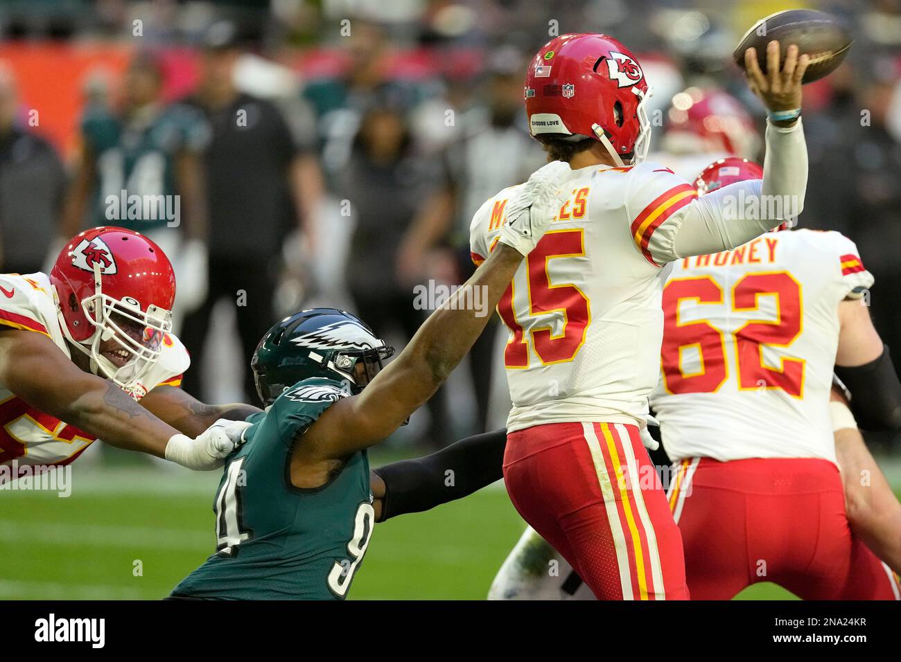 Philadelphia Eagles defensive end Josh Sweat, bottom, applies presure ...