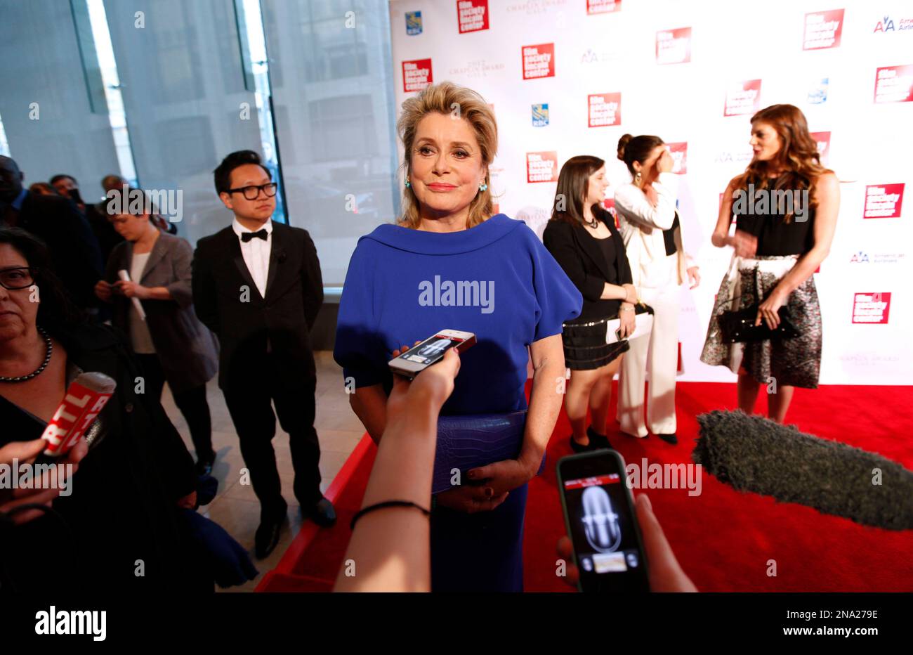 Actress Catherine Deneuve is interviewed as she arrives for the Film ...