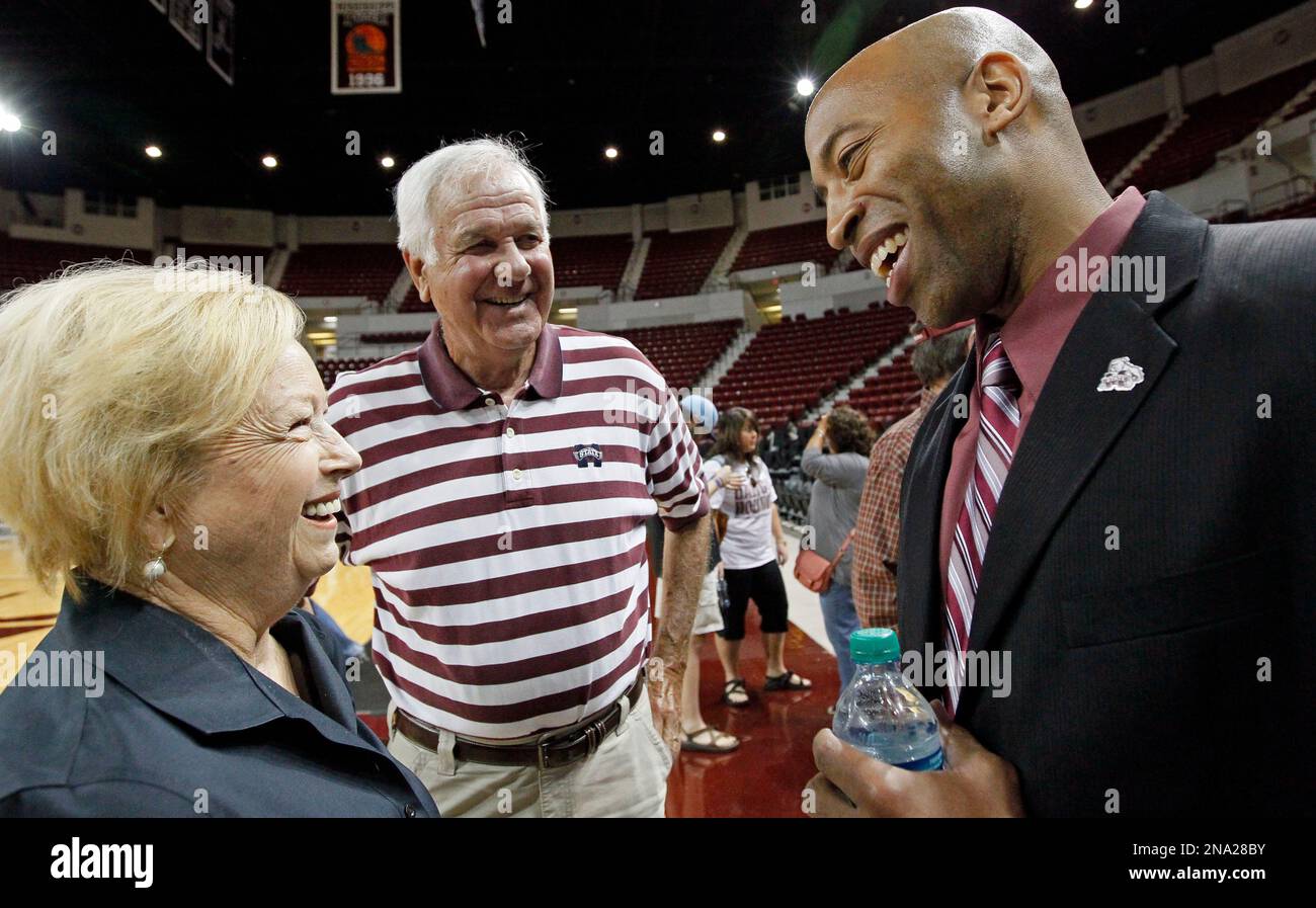 New Mississippi State basketball coach Rick Ray, right, laughs with ...