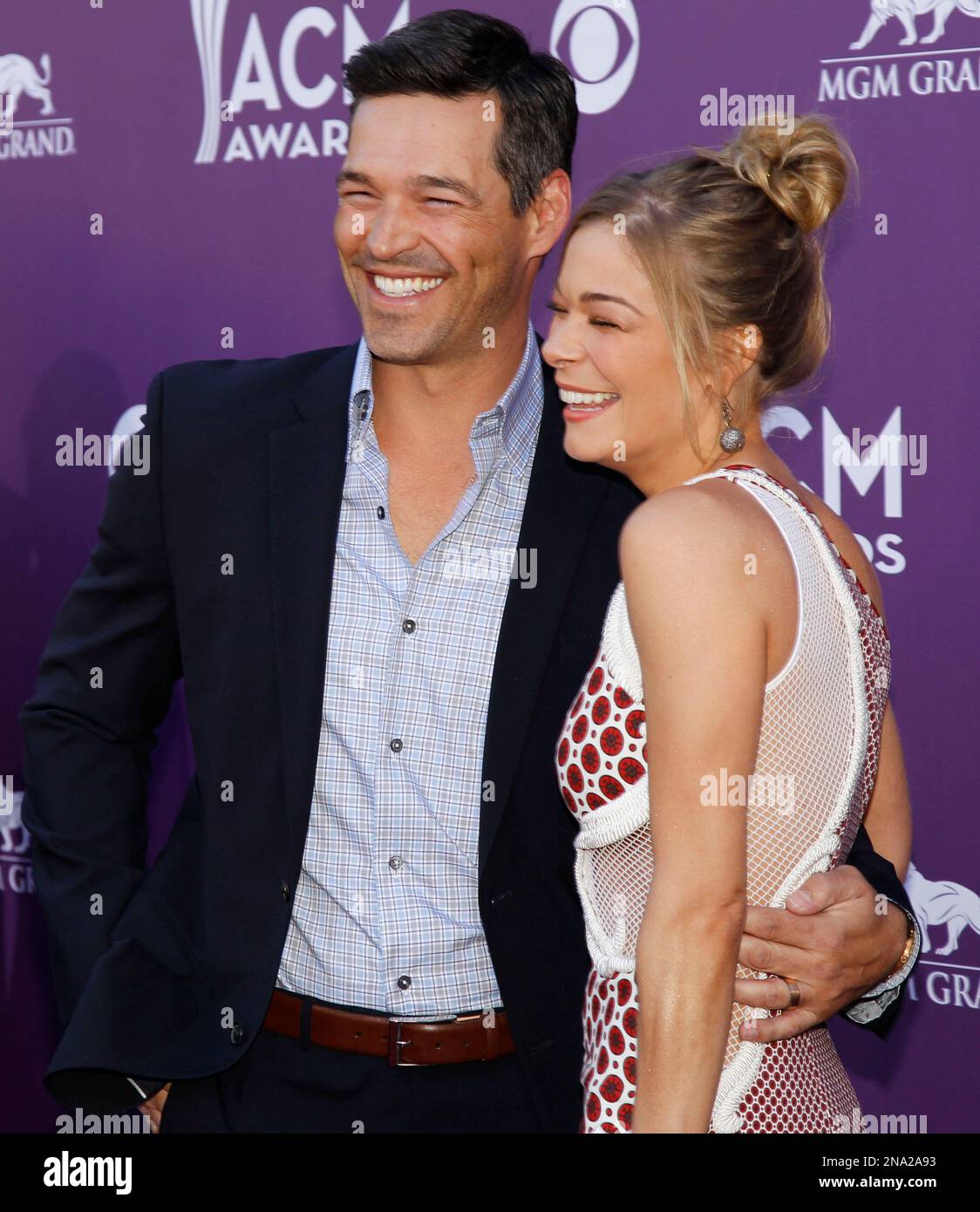 LeAnn Rimes, right, and Eddie Cibrian arrive at the 47th Annual Academy ...