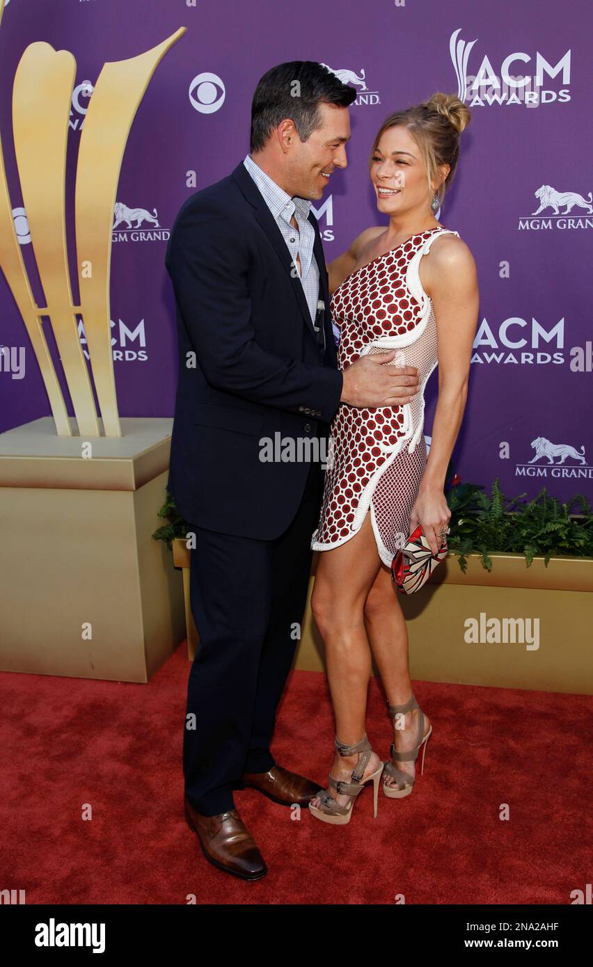 LeAnn Rimes, right, and Eddie Cibrian arrive at the 47th Annual Academy ...