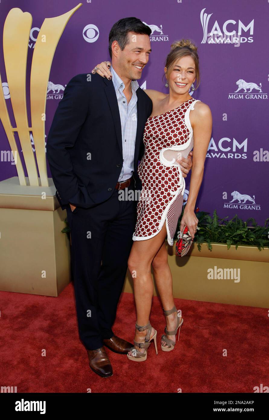 LeAnn Rimes, right, and Eddie Cibrian arrive at the 47th Annual Academy ...