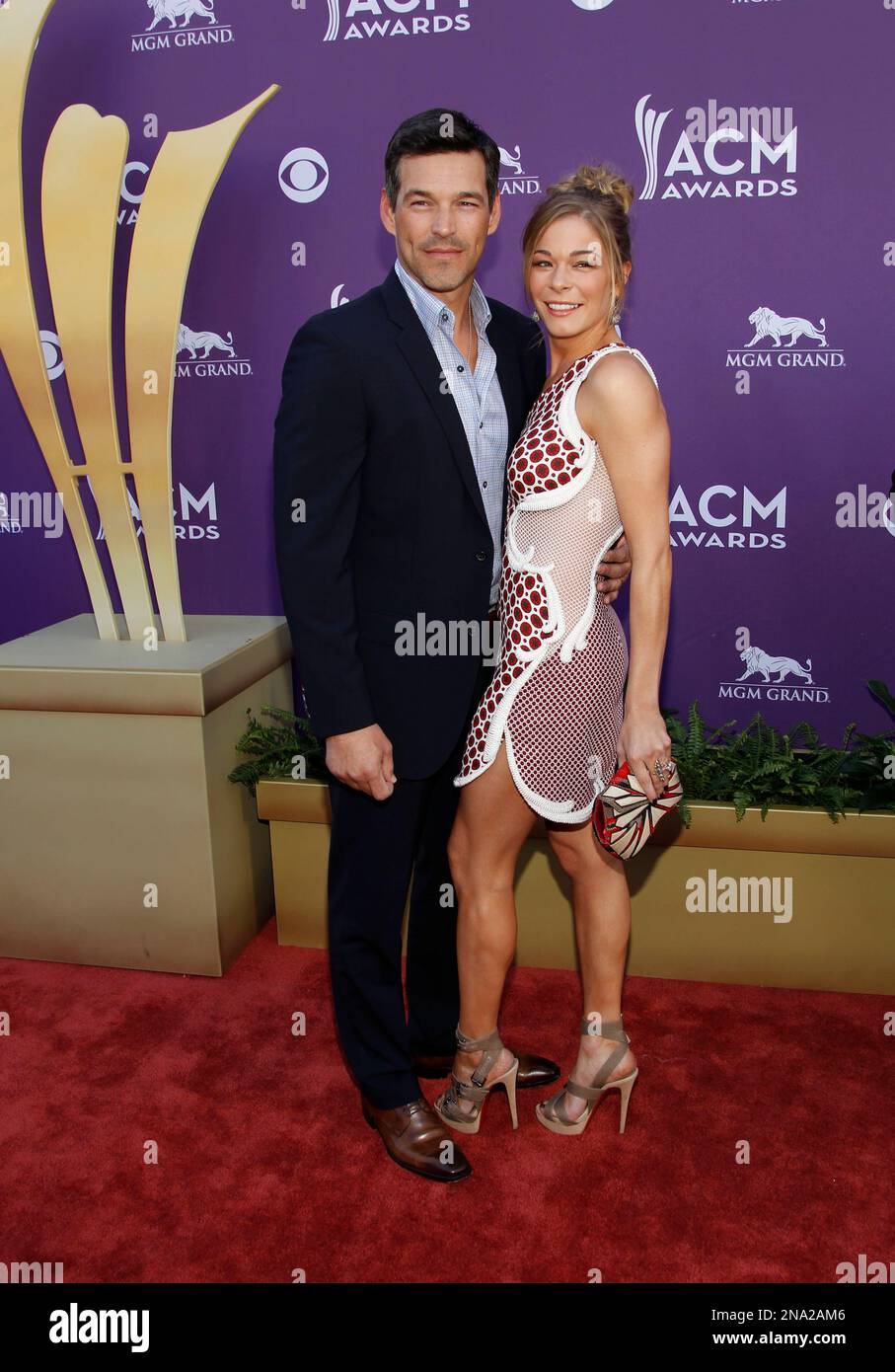 LeAnn Rimes, right, and Eddie Cibrian arrive at the 47th Annual Academy ...