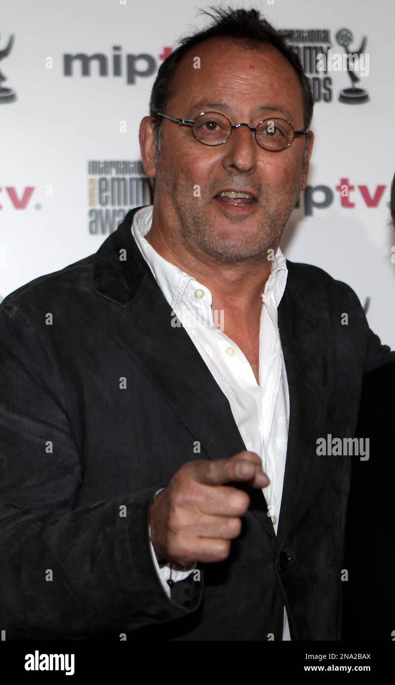 French actor Jean Reno poses for photographers during the MIPTV ...