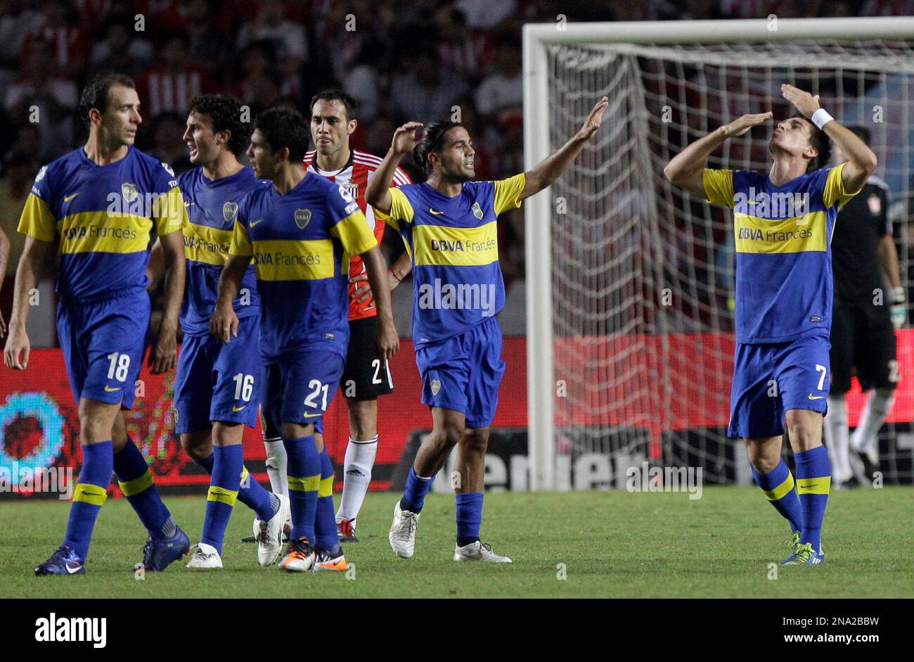 Boca Juniors' Pablo Mouche, right, celebrates with teammates after ...