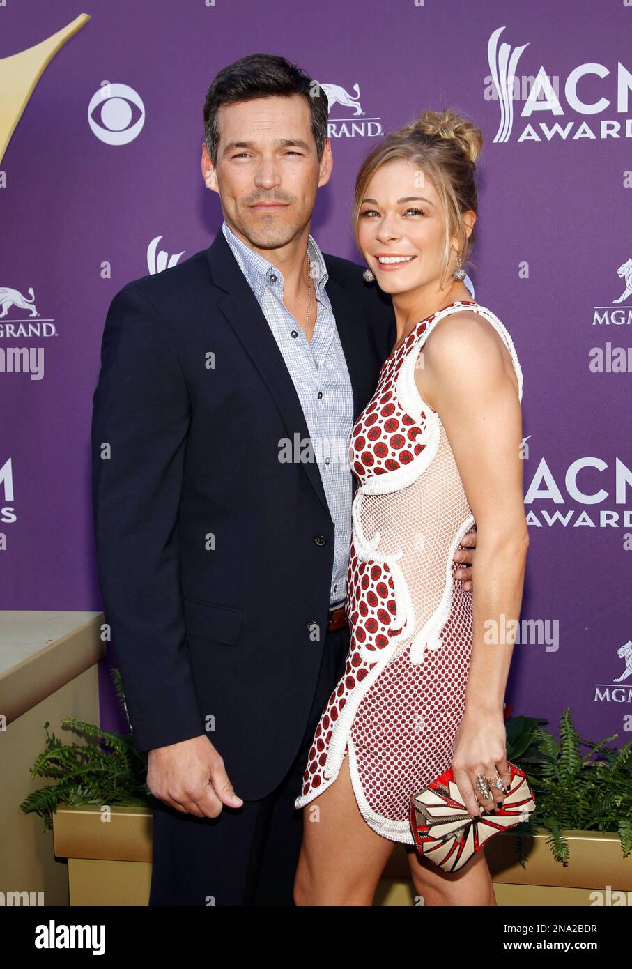LeAnn Rimes, right, and Eddie Cibrian arrive at the 47th Annual Academy of Country Music Awards ...