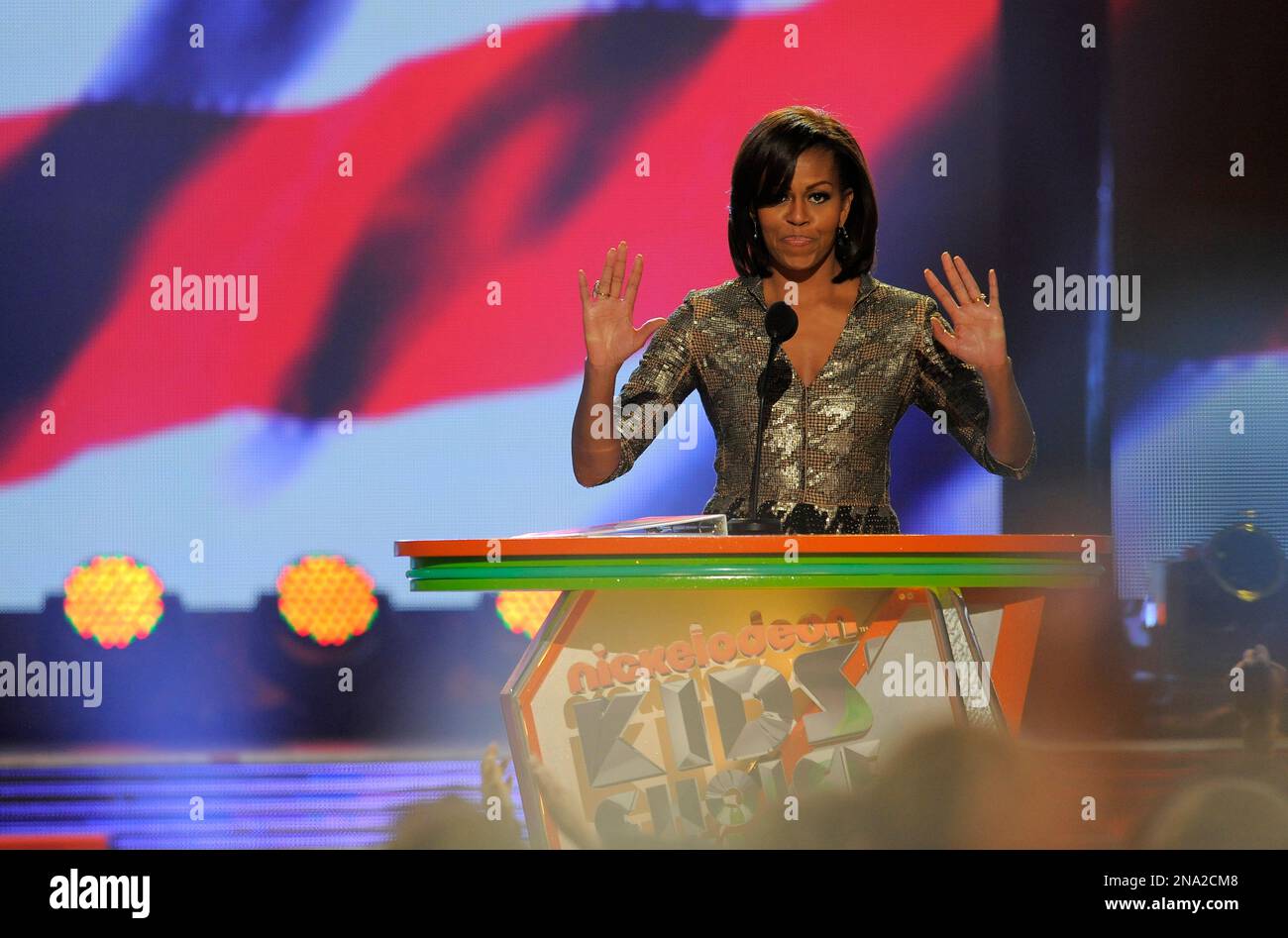 First lady Michelle Obama presents the big help award onstage at ...