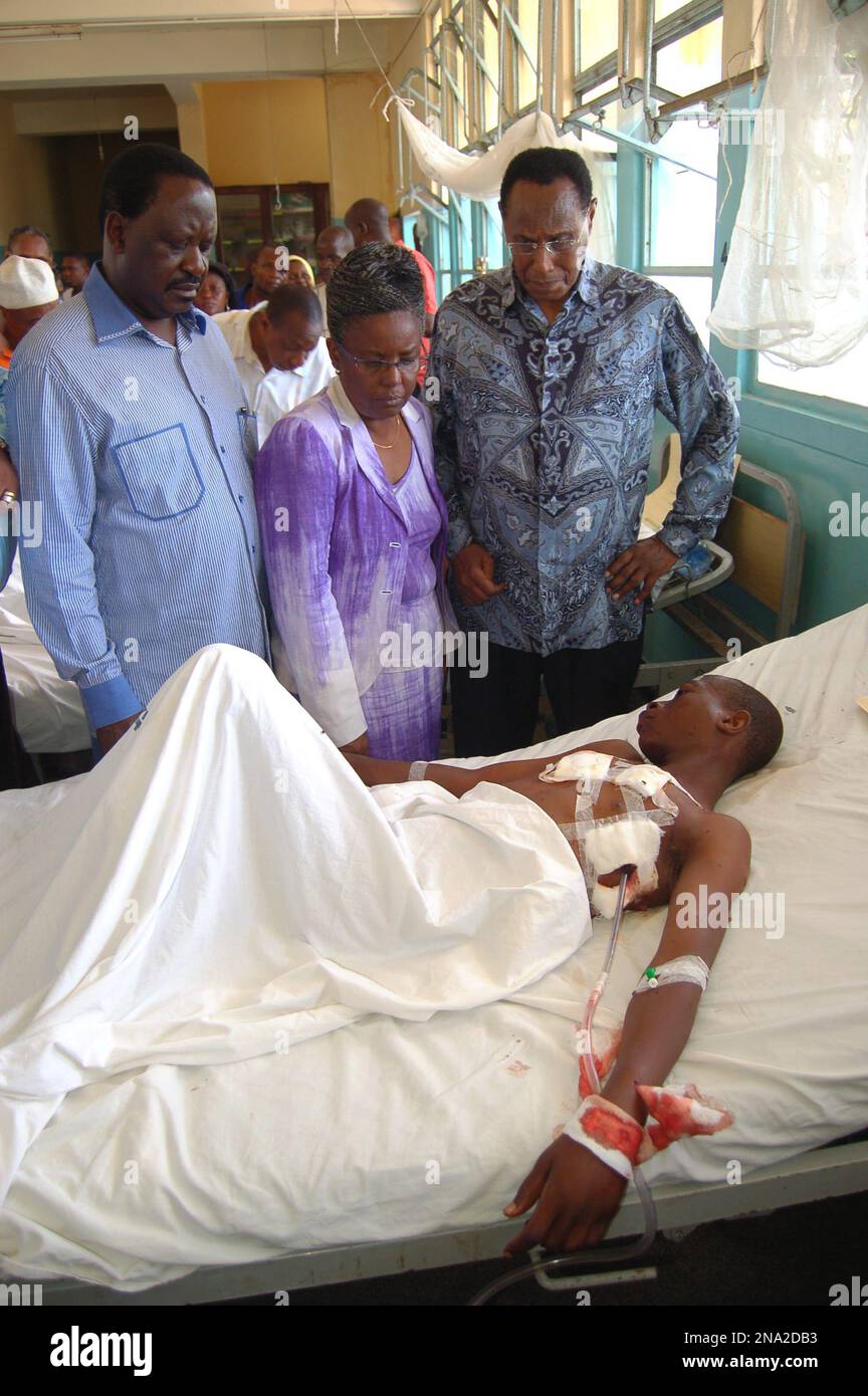 Kenya's Internal Security Minister Professor George Saitoti , right ...