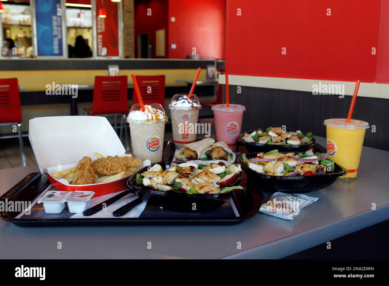 In this March 28, 2012 photo, new food items sit on display at a Burger ...
