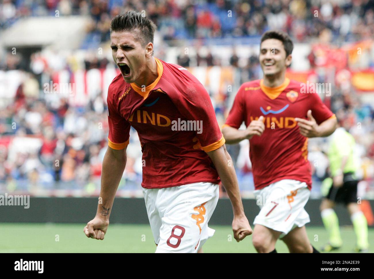 AS Roma forward Erik Lamela, of Argentina, left, celebrates after ...