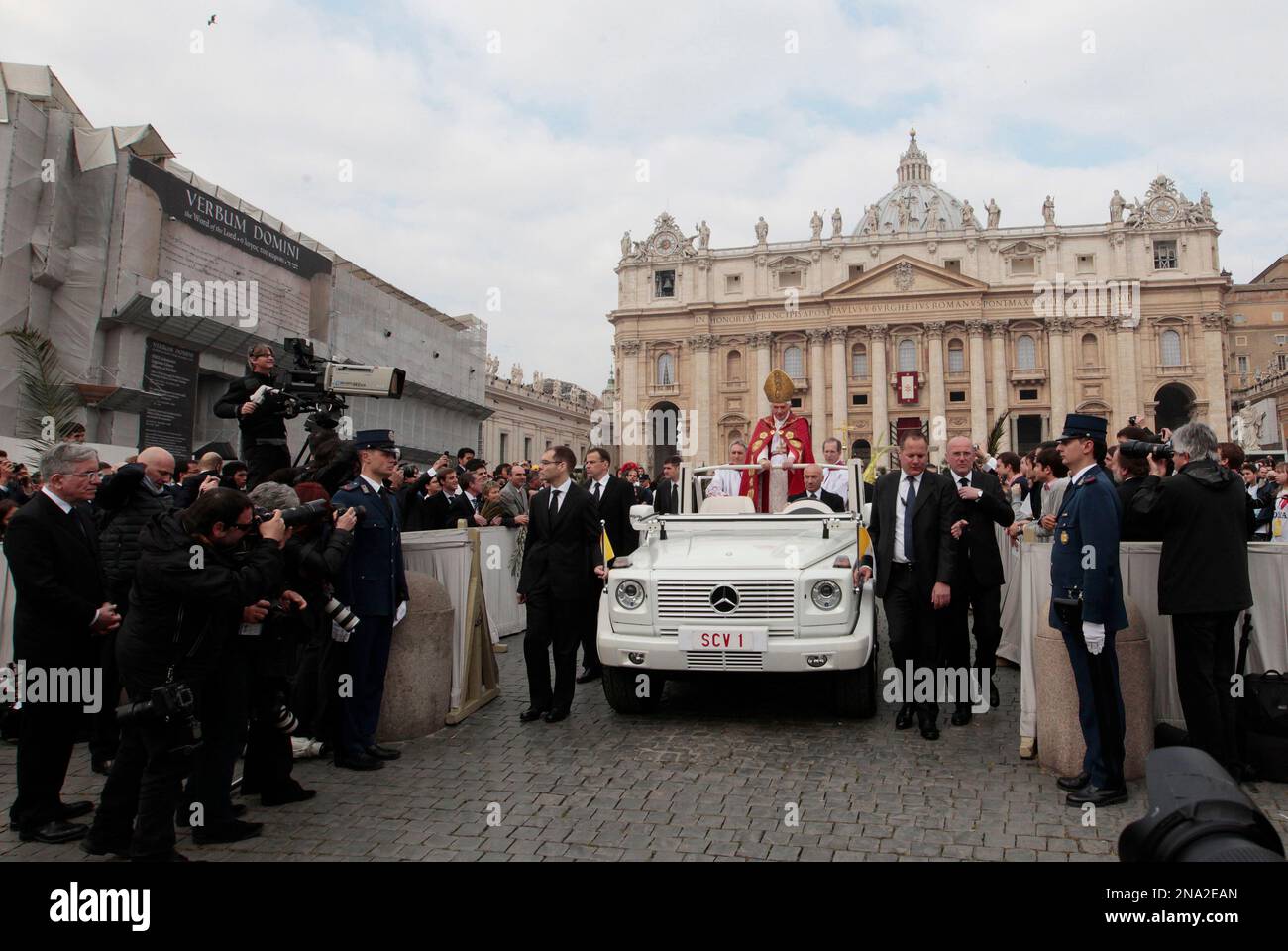 Pope Benedict XVI arrives aboard his popemobile at St. Peter's square ...