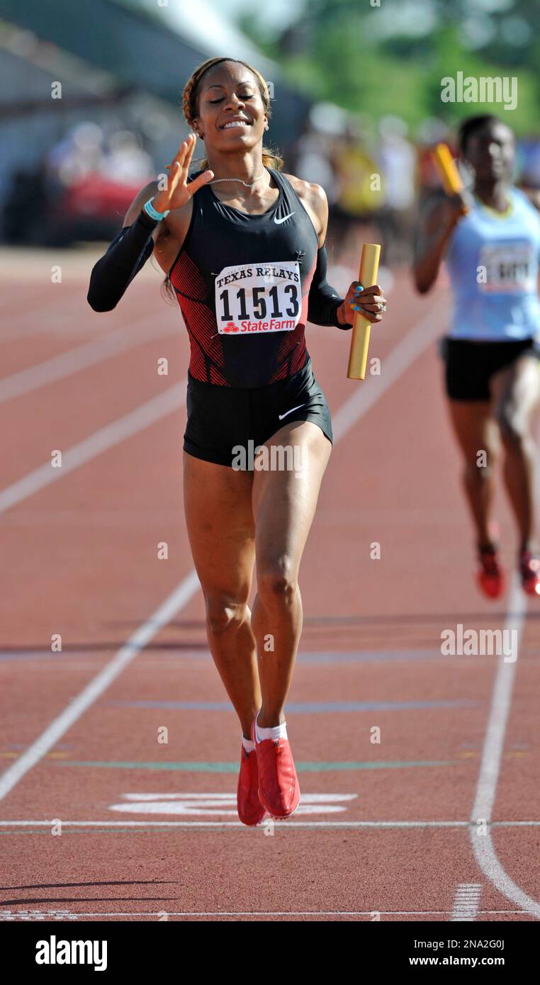Sanya Richards-Ross, running for the Hart of Texas team, crosses the ...
