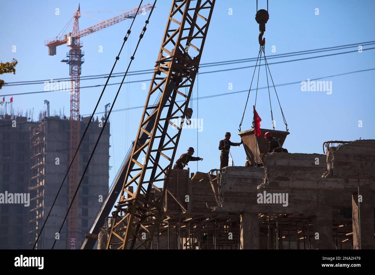 In this Tuesday Oct. 11, 2011 photo, North Korean construction workers ...