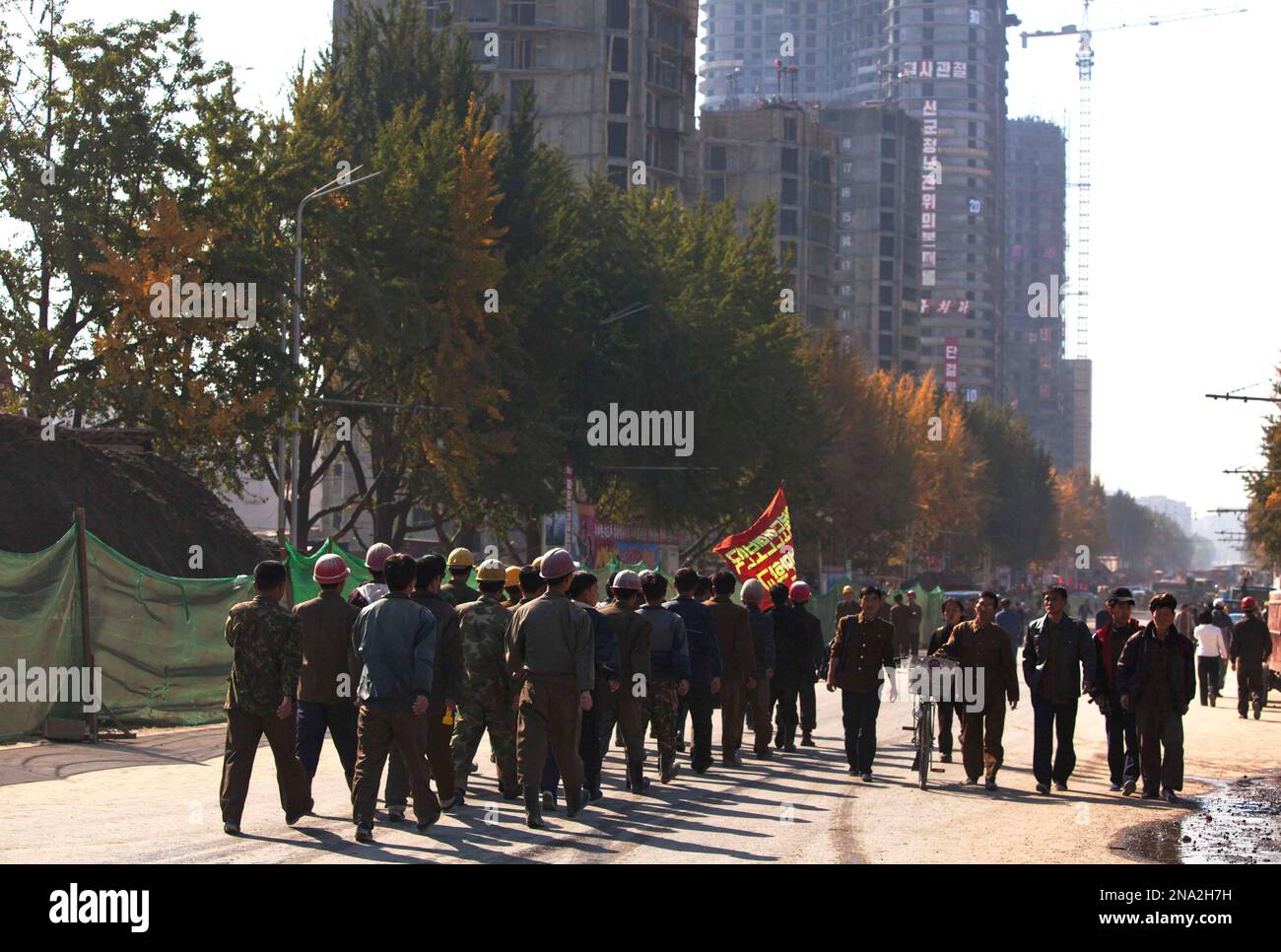In this Tuesday Oct. 11, 2011 photo, North Korean construction workers ...