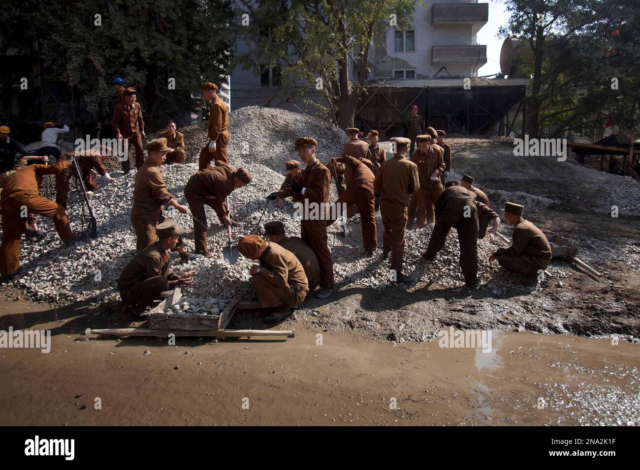 In this Tuesday Oct. 11, 2011 photo, North Korean construction workers ...