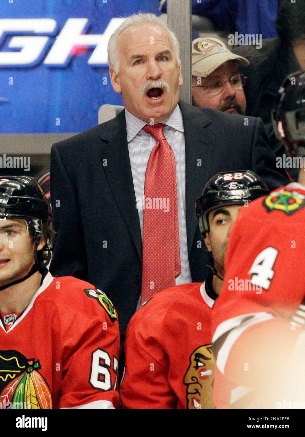Chicago Blackhawks coach Joel Quenneville yells to his team during the ...