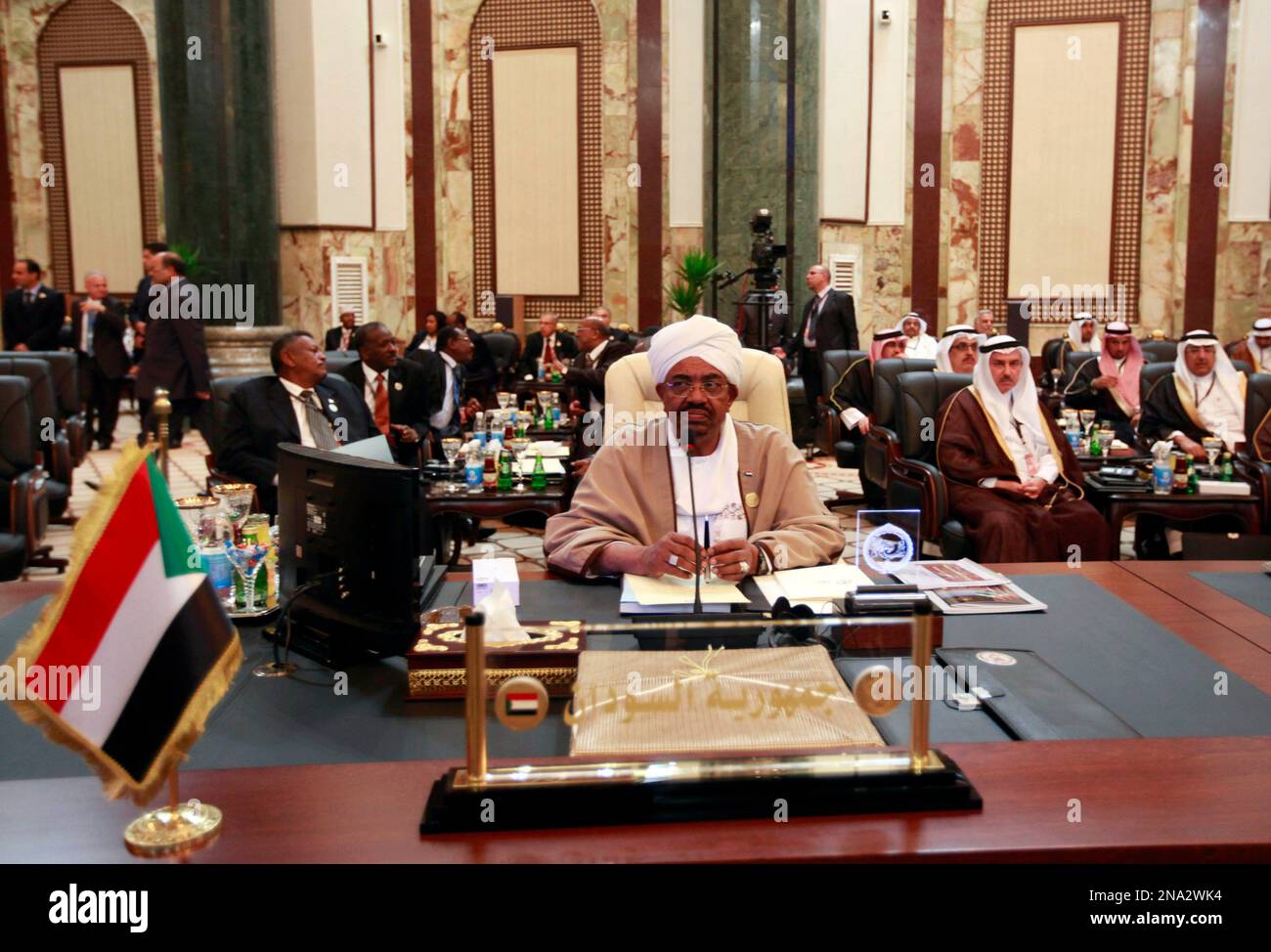 Sudanese President Omar al-Bashir, center, attends the Arab League summit in Baghdad, Iraq ...
