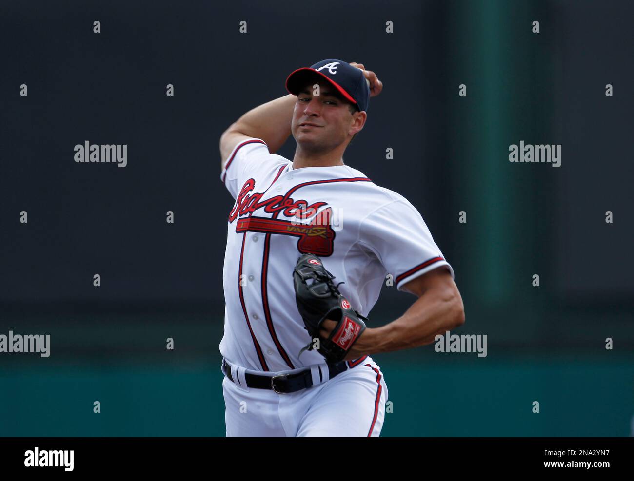 Atlanta Braves starting pitcher Brandon Beachy warms up against the ...