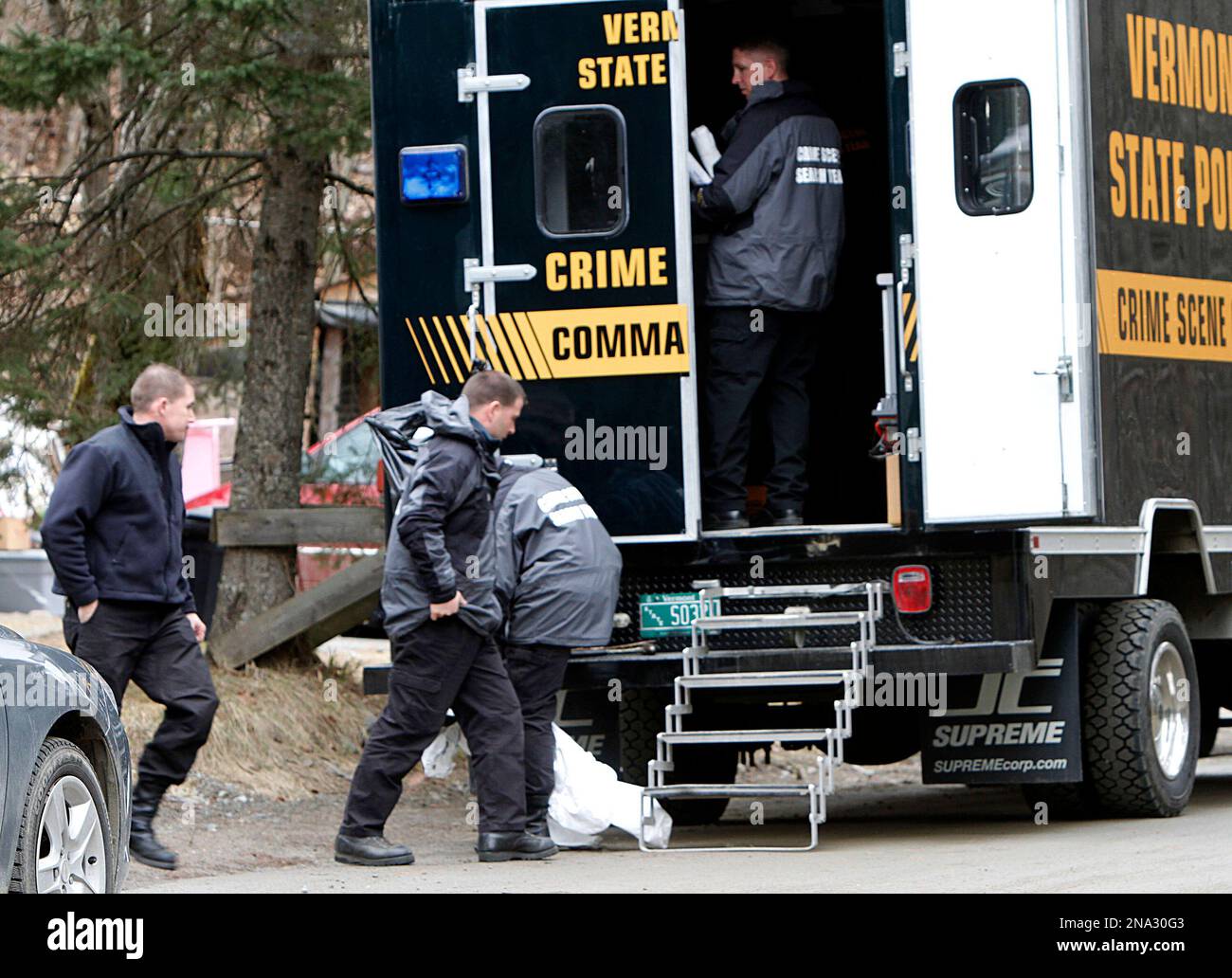 Vermont State Police crime scene investigators are seen at the home of ...