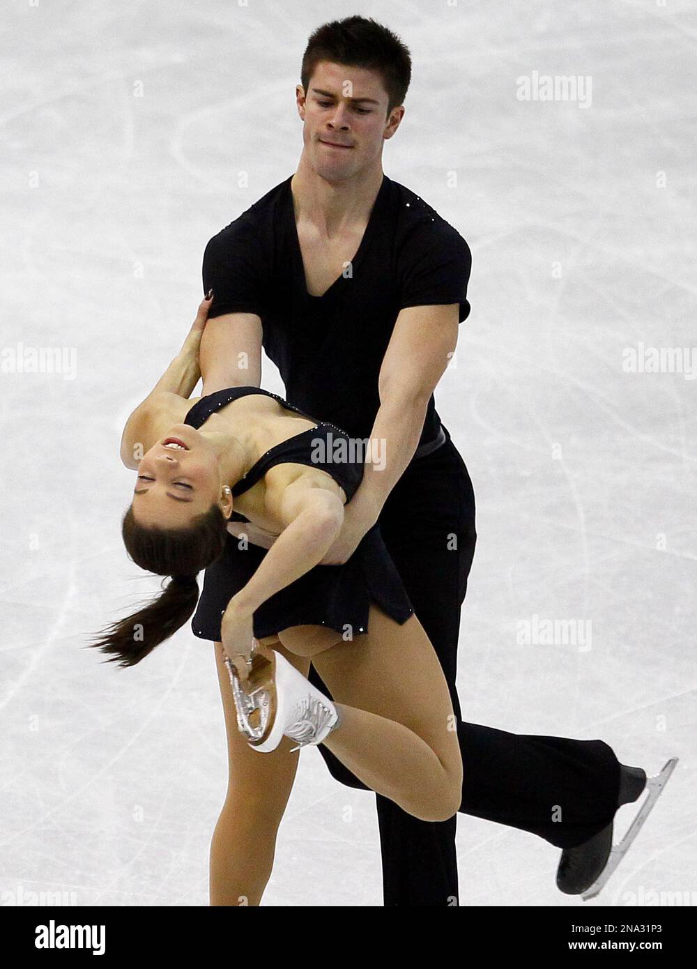 Jessica Dube and Sebastien Wolfe of Canada perform during their Pairs ...