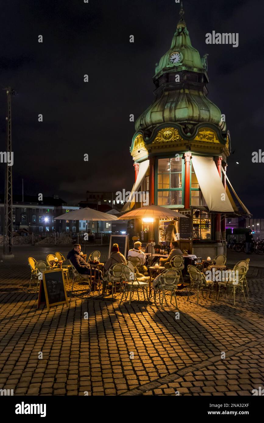 Small cafe in town square at night; Copenhagen, Denmark Stock Photo - Alamy