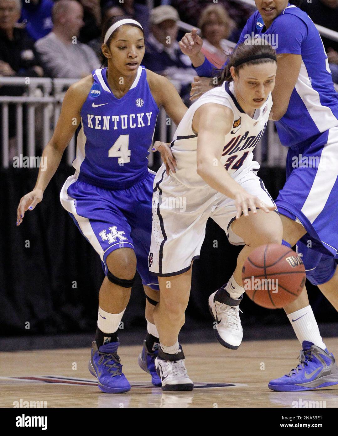 Connecticut guard Kelly Faris (34) pulls in a loose ball as Kentucky ...