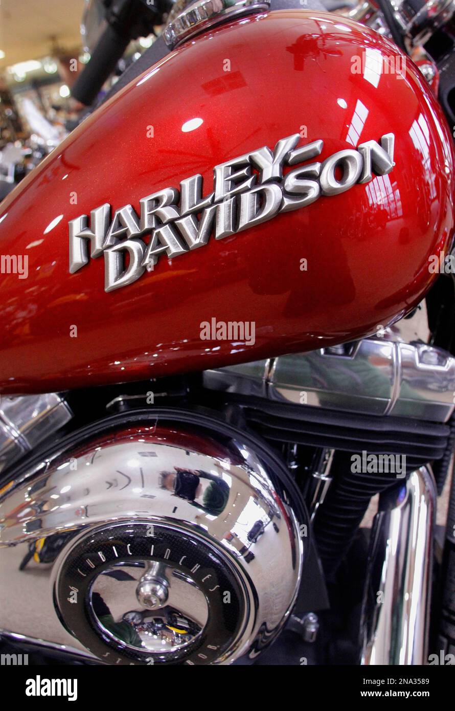 The Harley-Davidson logo is seen on a new motorcycle for sale in the ...