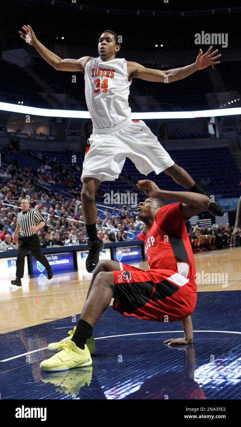 Imhotep's Brandon Austin (1), and Beaver Falls' Sheldon Jeter (34) play ...