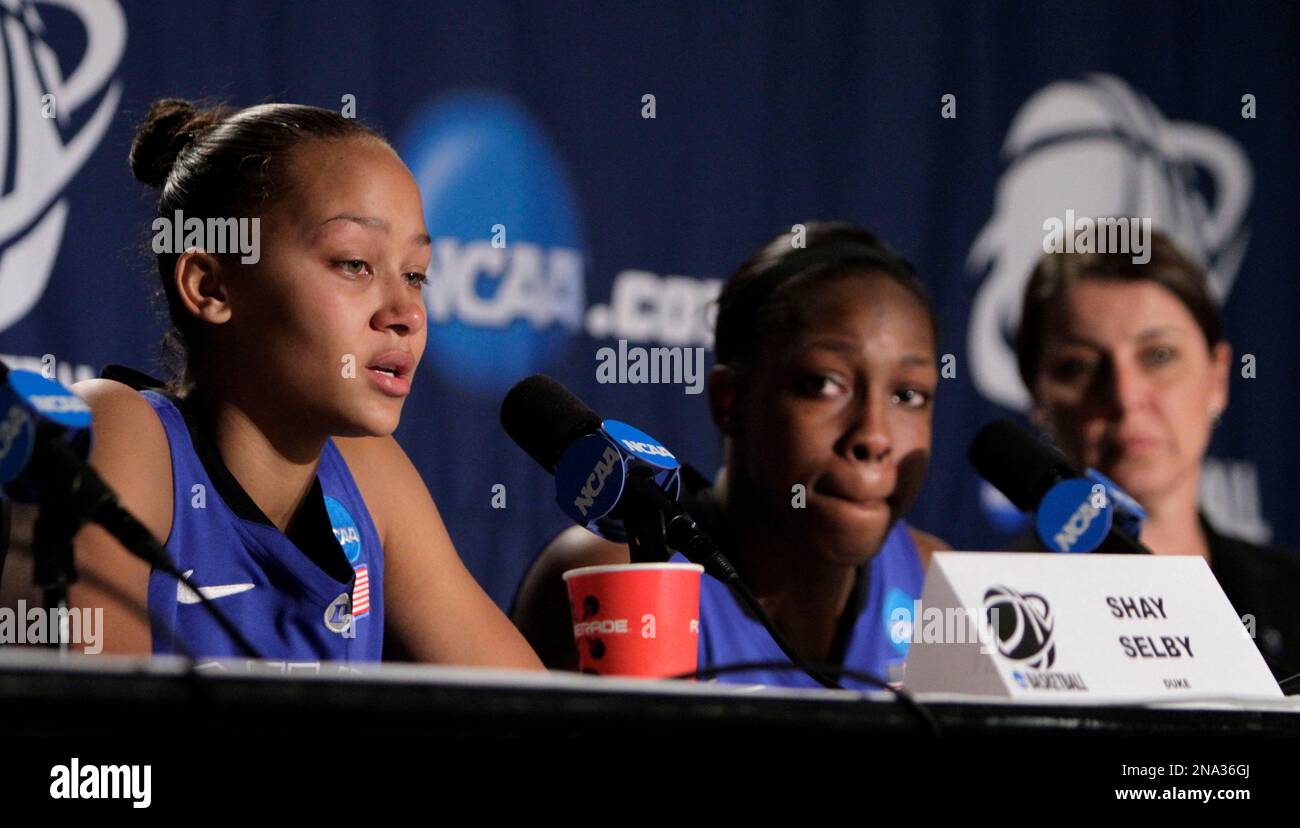 Duke's Shay Selby, left, responds to a question concerning Duke's loss ...