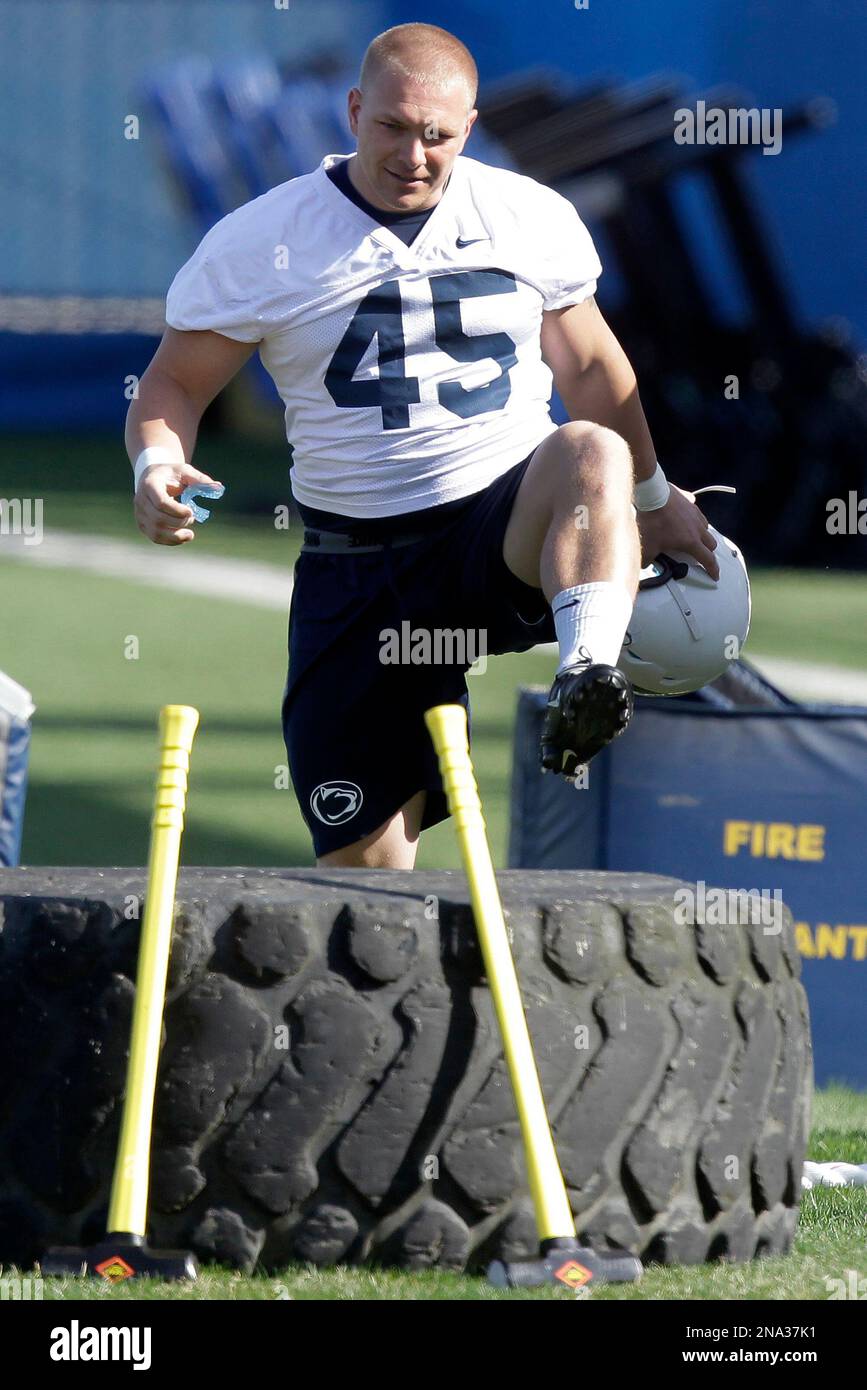 Penn State fullback P.J. Byers (45) walks onto the practice field for ...