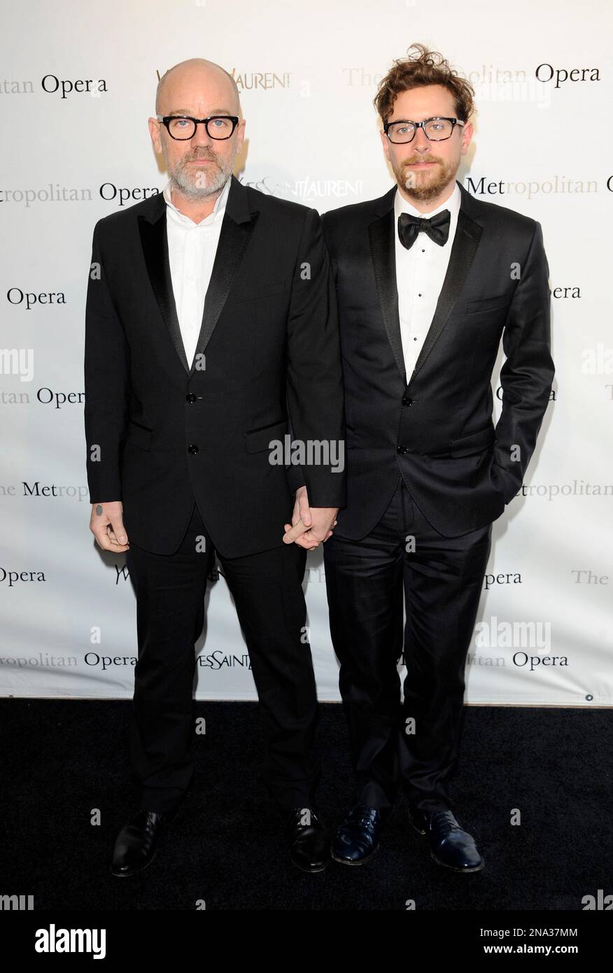 Singer Michael Stipe, left, and his boyfriend Thomas Dozol attend the ...